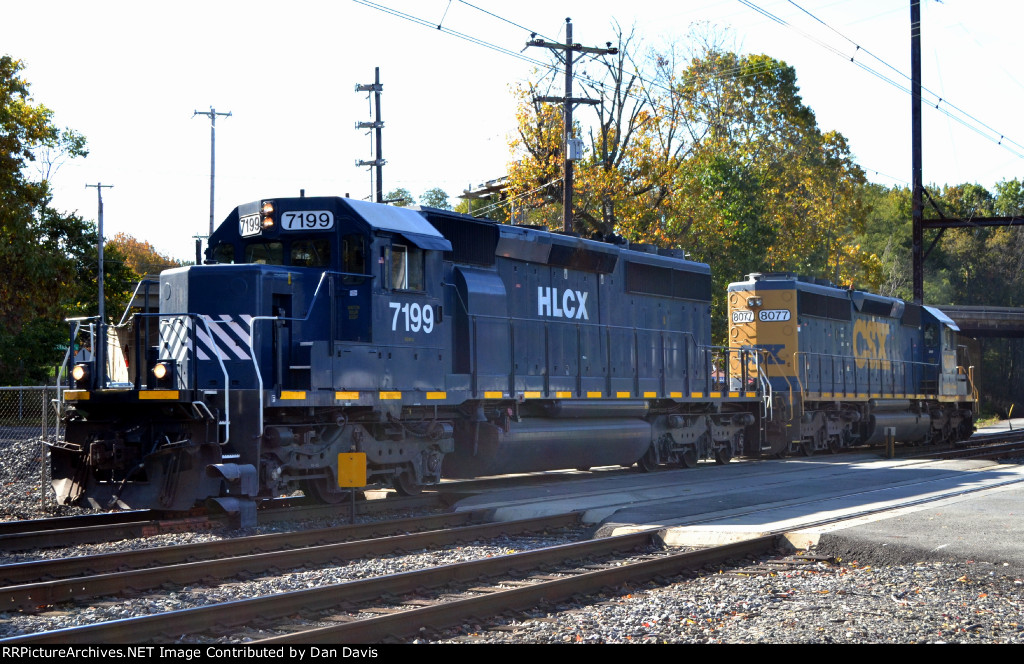 HLCX SD40-2 7199 leads Q300-16
